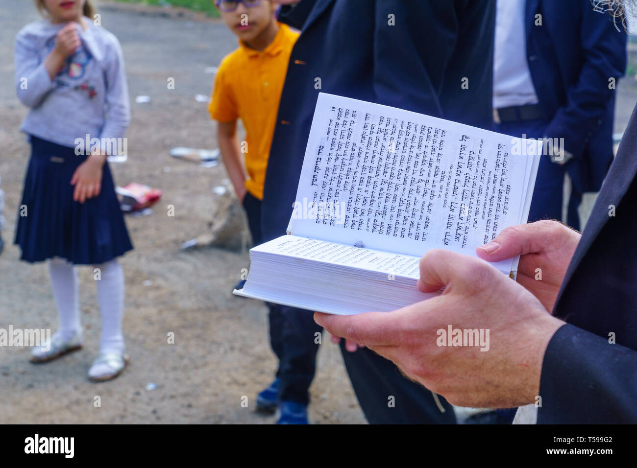 Haifa, Israel - April 19, 2019: Jewish man read a blessing, part of a ...