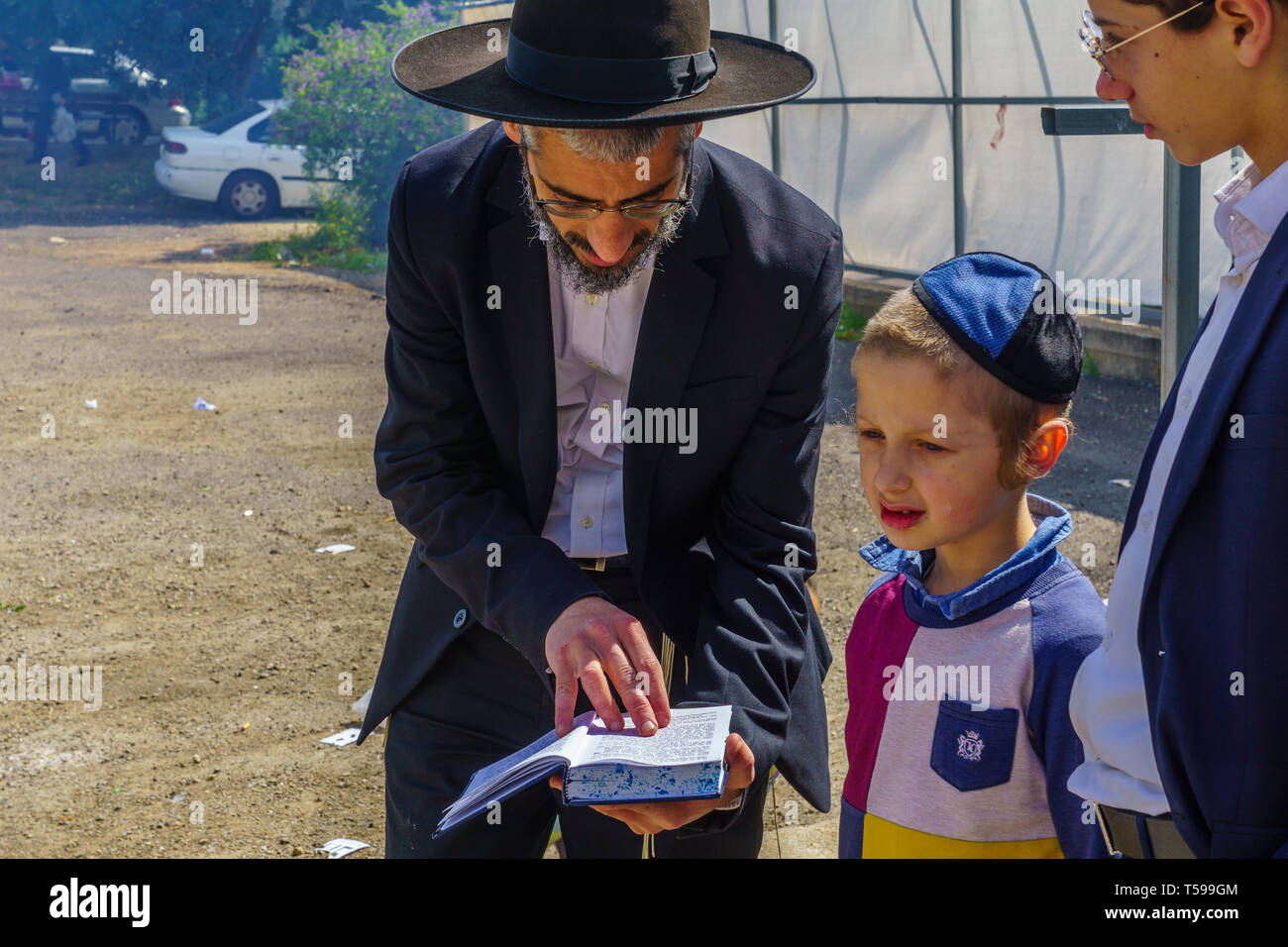 Haifa, Israel - April 19, 2019: Jewish man read a blessing, part of a ...