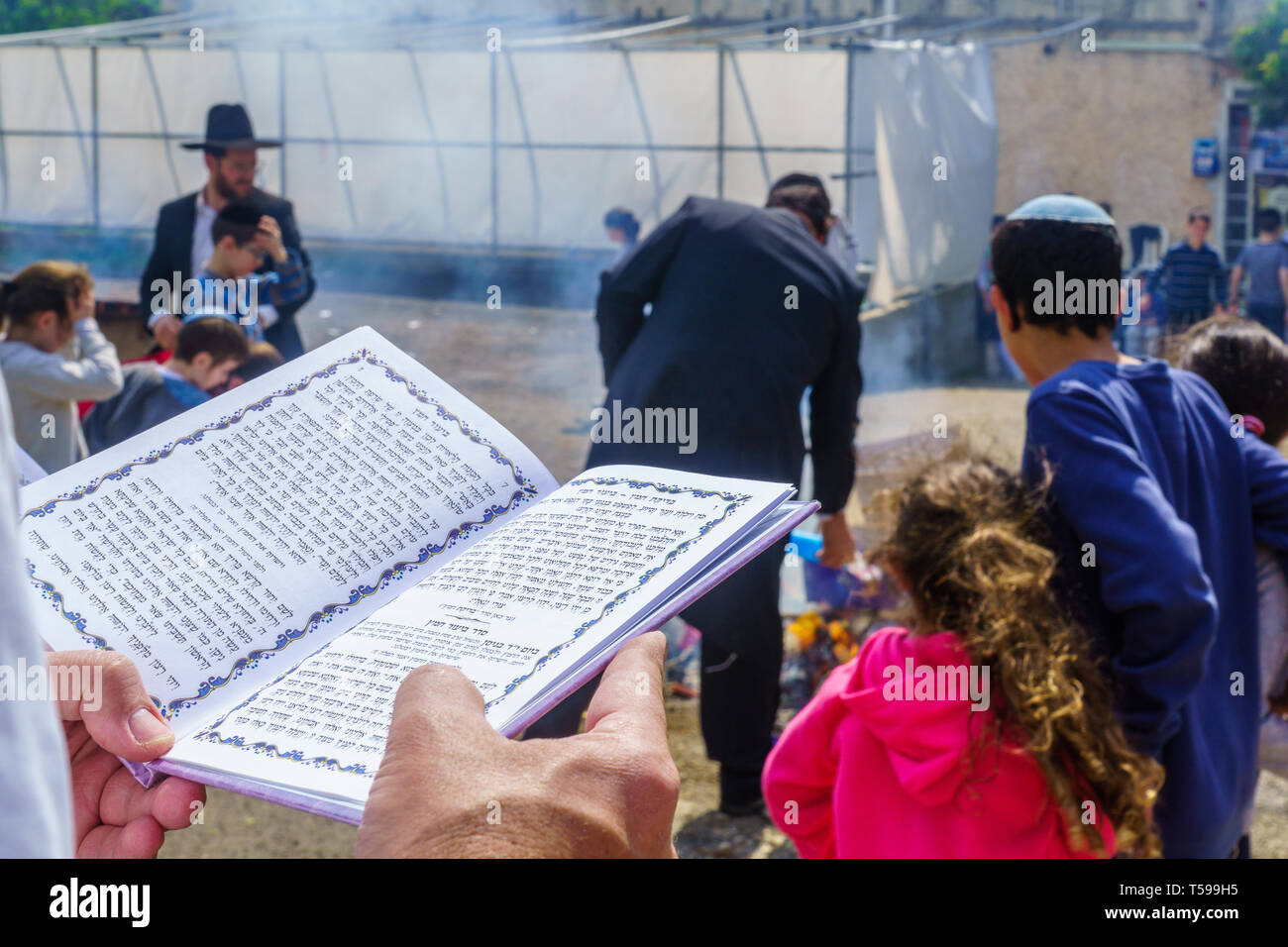 Haifa, Israel - April 19, 2019: Jewish man read a blessing, part of a ...