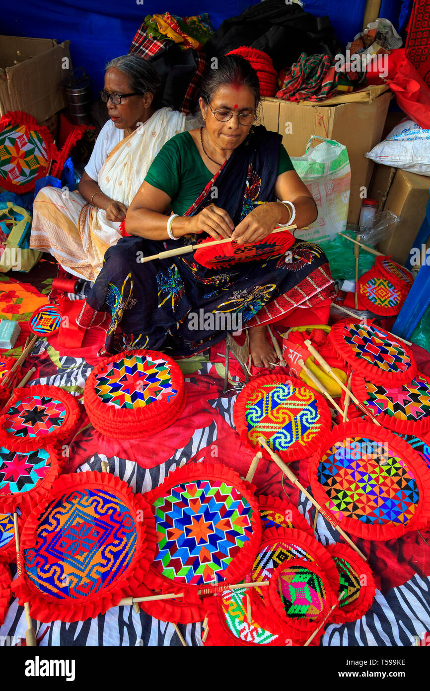 Traditional had fans at a stall in Bou Mela, an ancient rural fair at ...