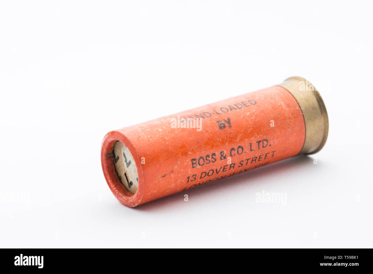 A Boss & Co paper case 12 gauge shotgun cartridge with a rolled ...