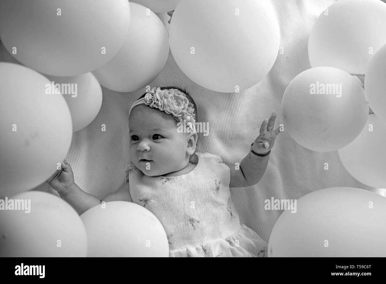 Like on catwalk. Sweet little baby. New life and birth. Small girl ...