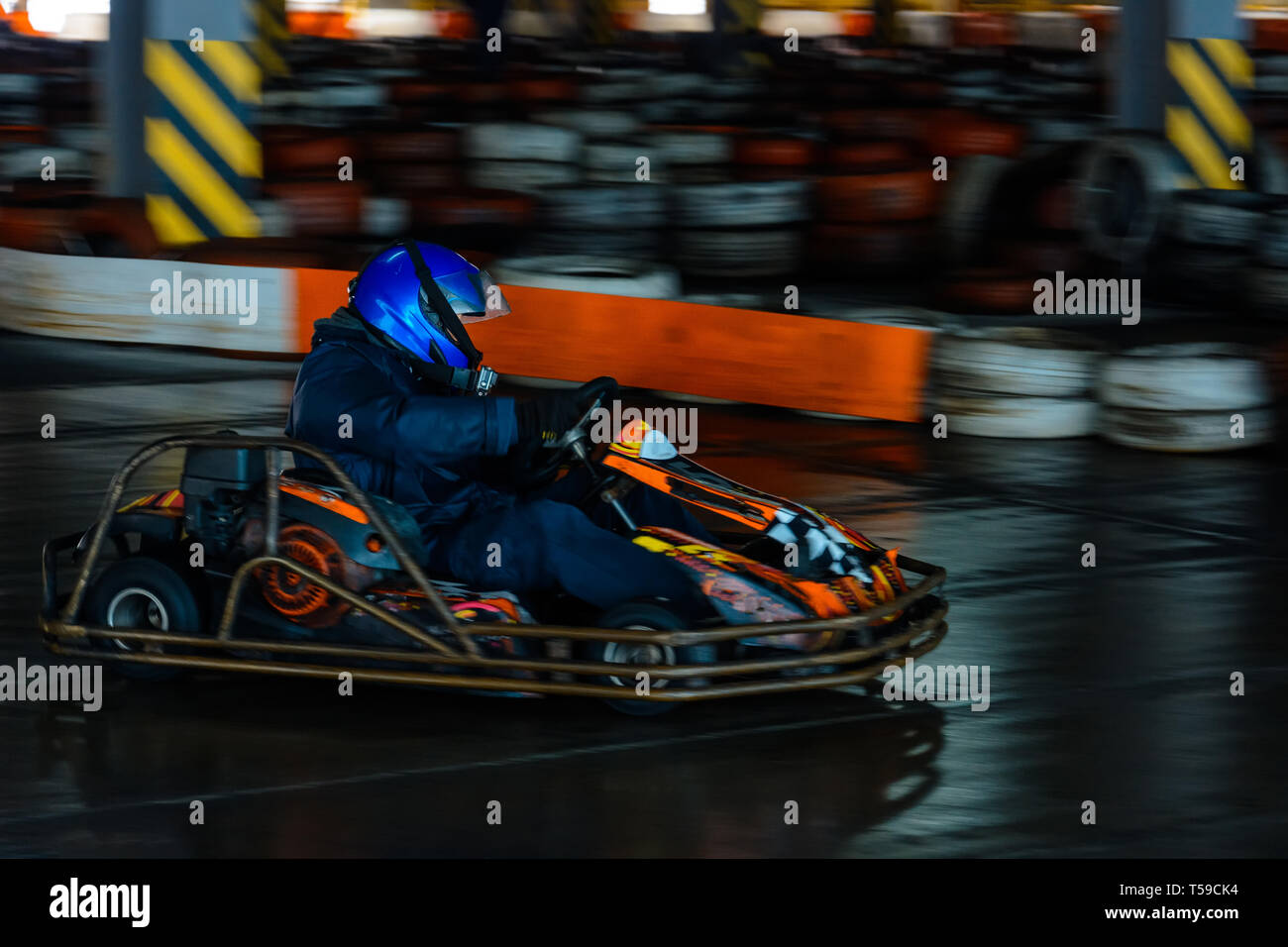 Dynamic karting competition at speed with blurry motion on an equipped ...