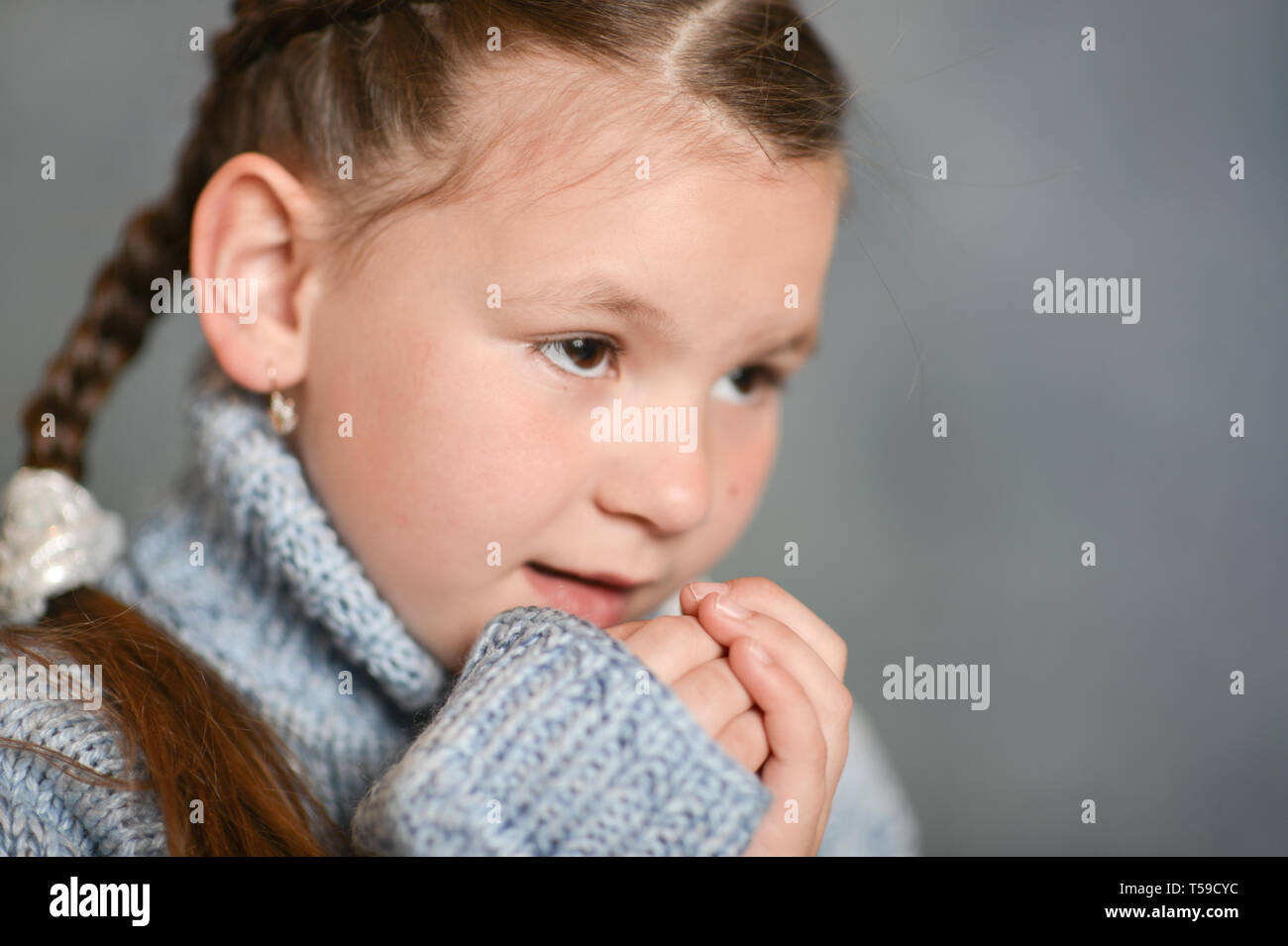 Close up portrait of cute sick girl Stock Photo - Alamy