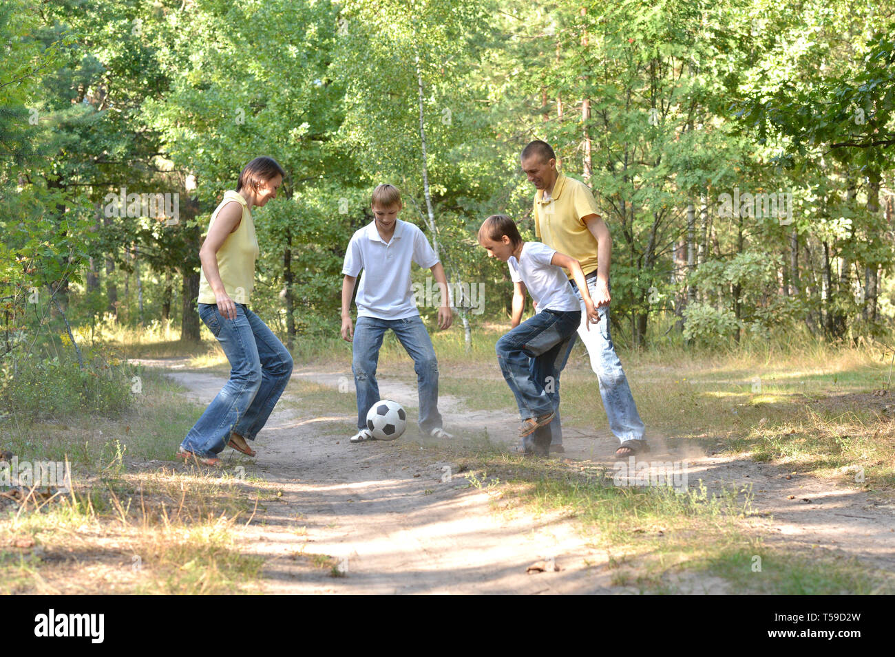 Brothers playing football hi-res stock photography and images - Alamy