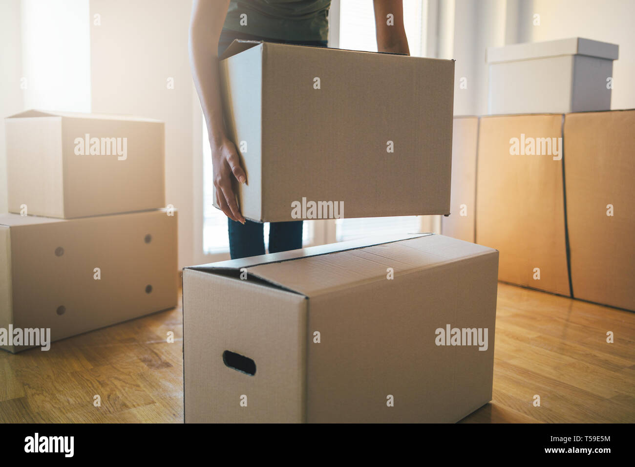 Dropping boxes hi-res stock photography and images - Alamy