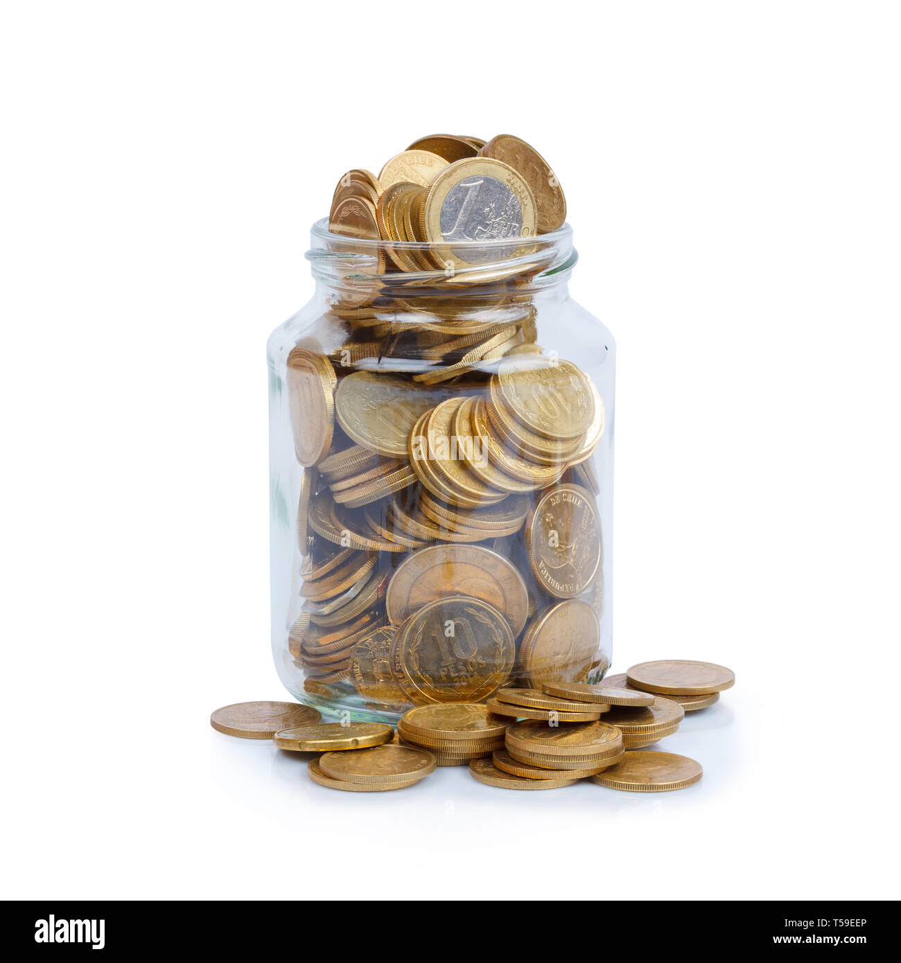 Glass jar full of coins isolated on white background Stock Photo - Alamy