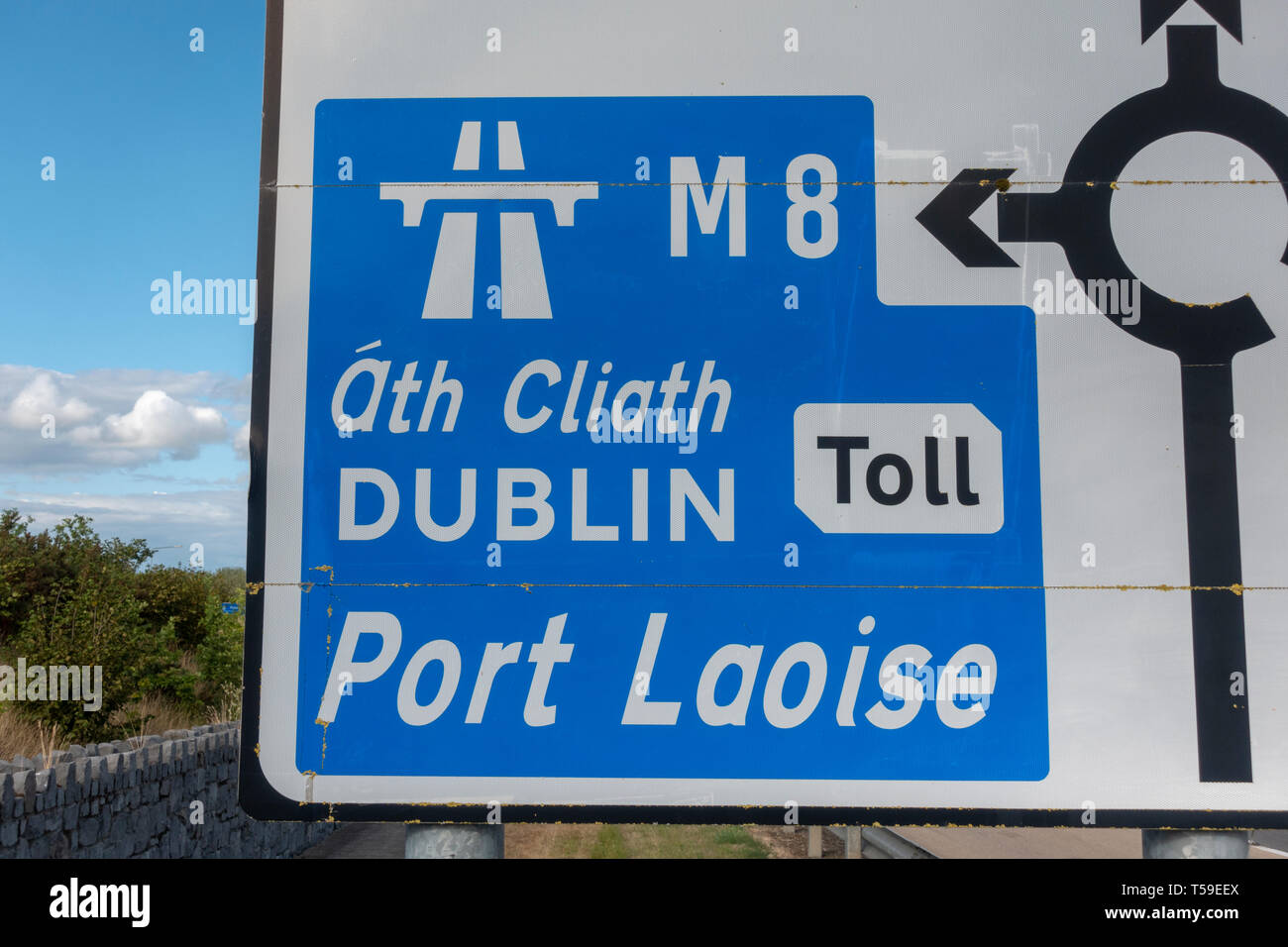 A M8 road sign, Manor Stone Service Station on the M8 Motorway, Tintore ...