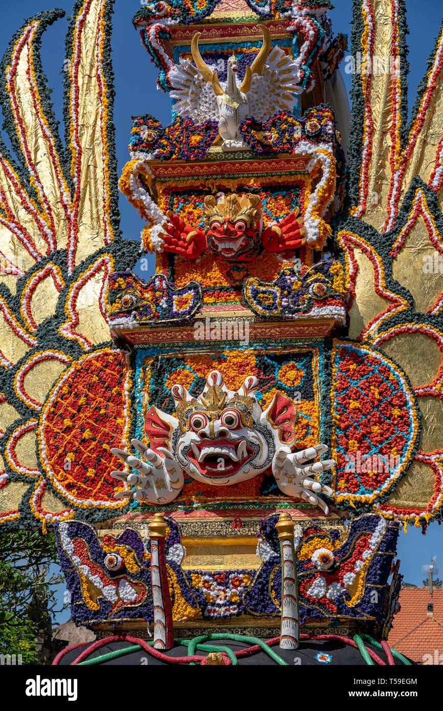 Bade cremation tower with traditional balinese sculptures of demons and ...