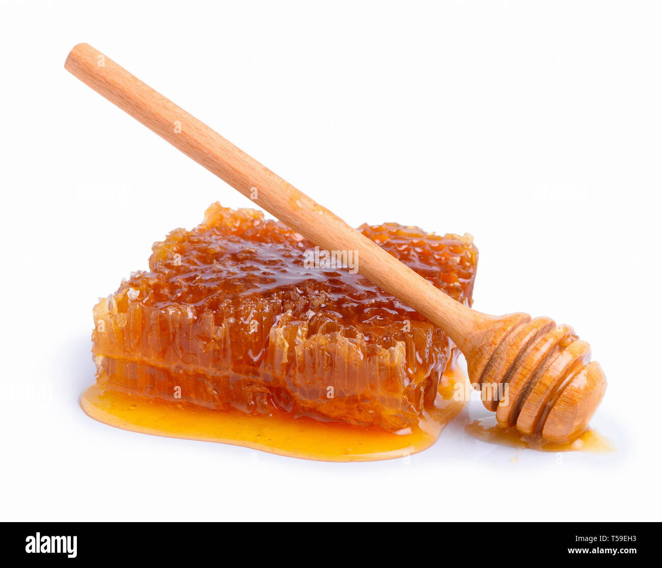Honeycomb and honey dipper isolated on white Stock Photo - Alamy