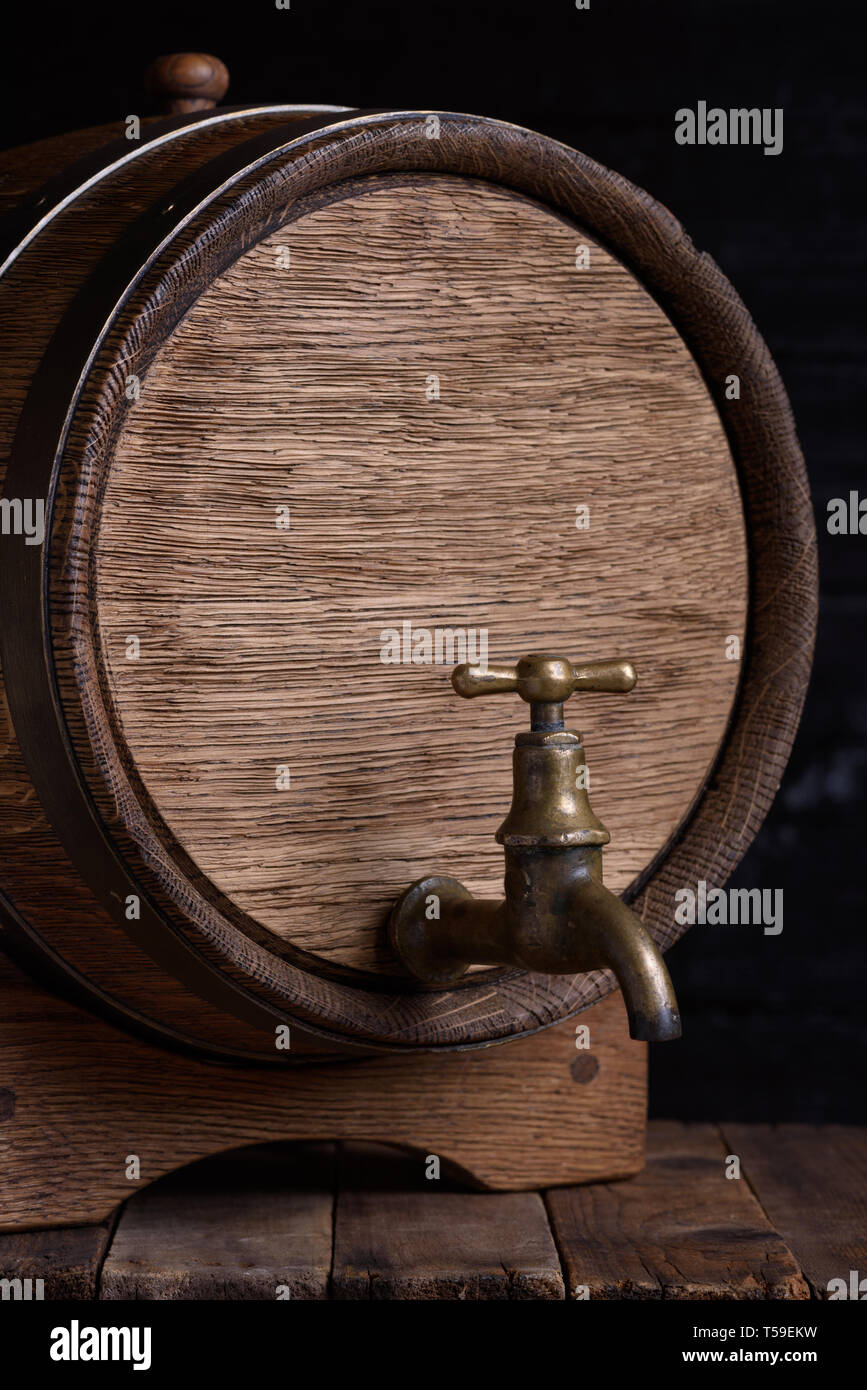 Old barrel on wooden table still life Stock Photo - Alamy