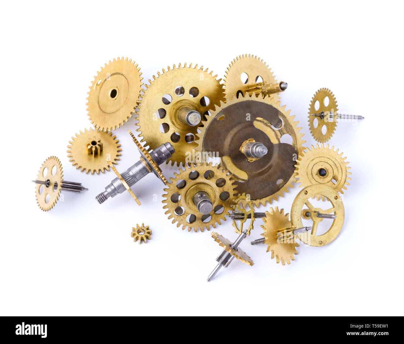 Different small gears heap on white background Stock Photo - Alamy