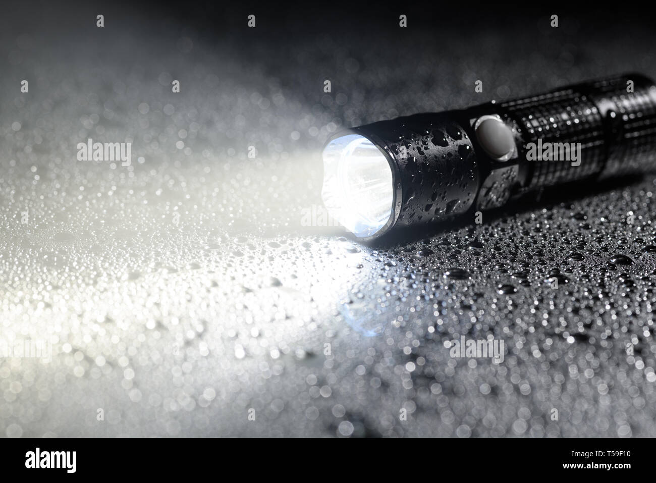 Tactical waterproof flashlight Stock Photo - Alamy