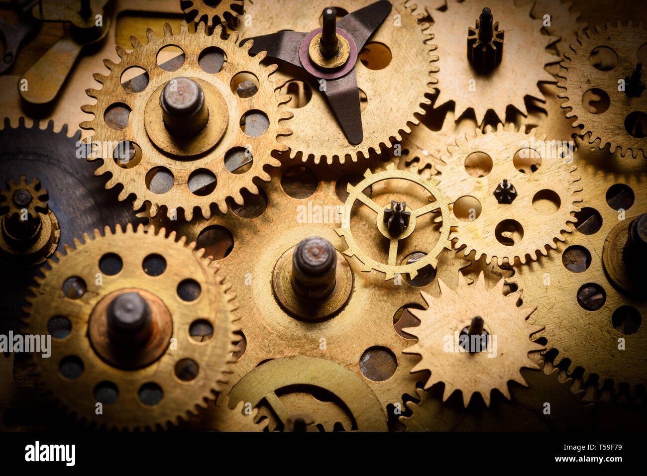Cog cogs brass hi-res stock photography and images - Alamy