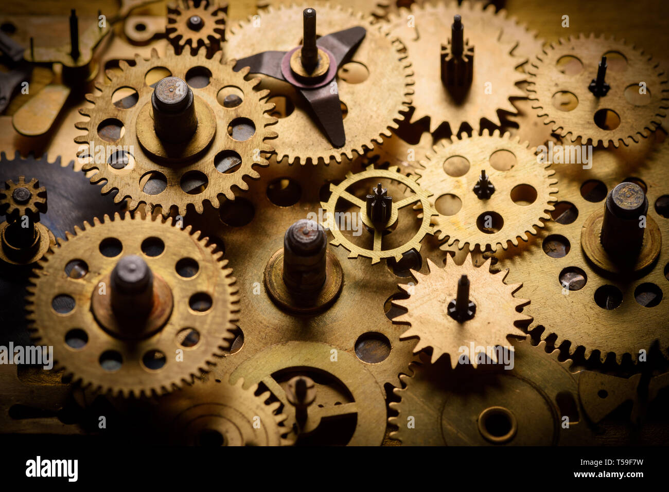 Cog cogs brass hi-res stock photography and images - Alamy
