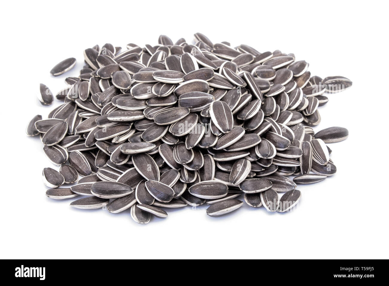 Handful of sunflower seeds hi-res stock photography and images - Alamy