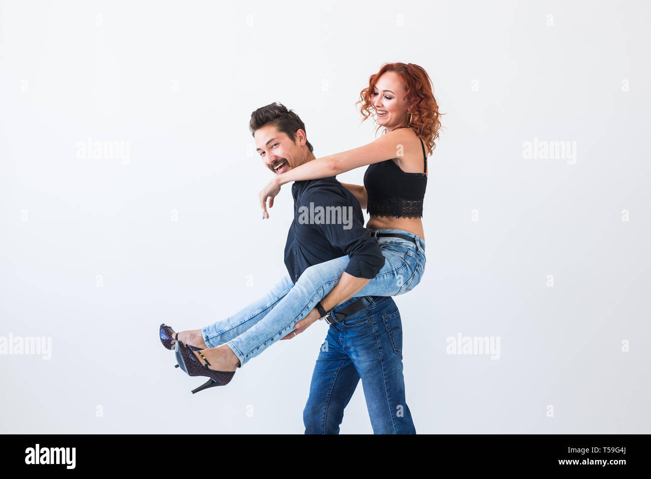 Friendship, people concept - young woman jumped on the man's back Stock ...