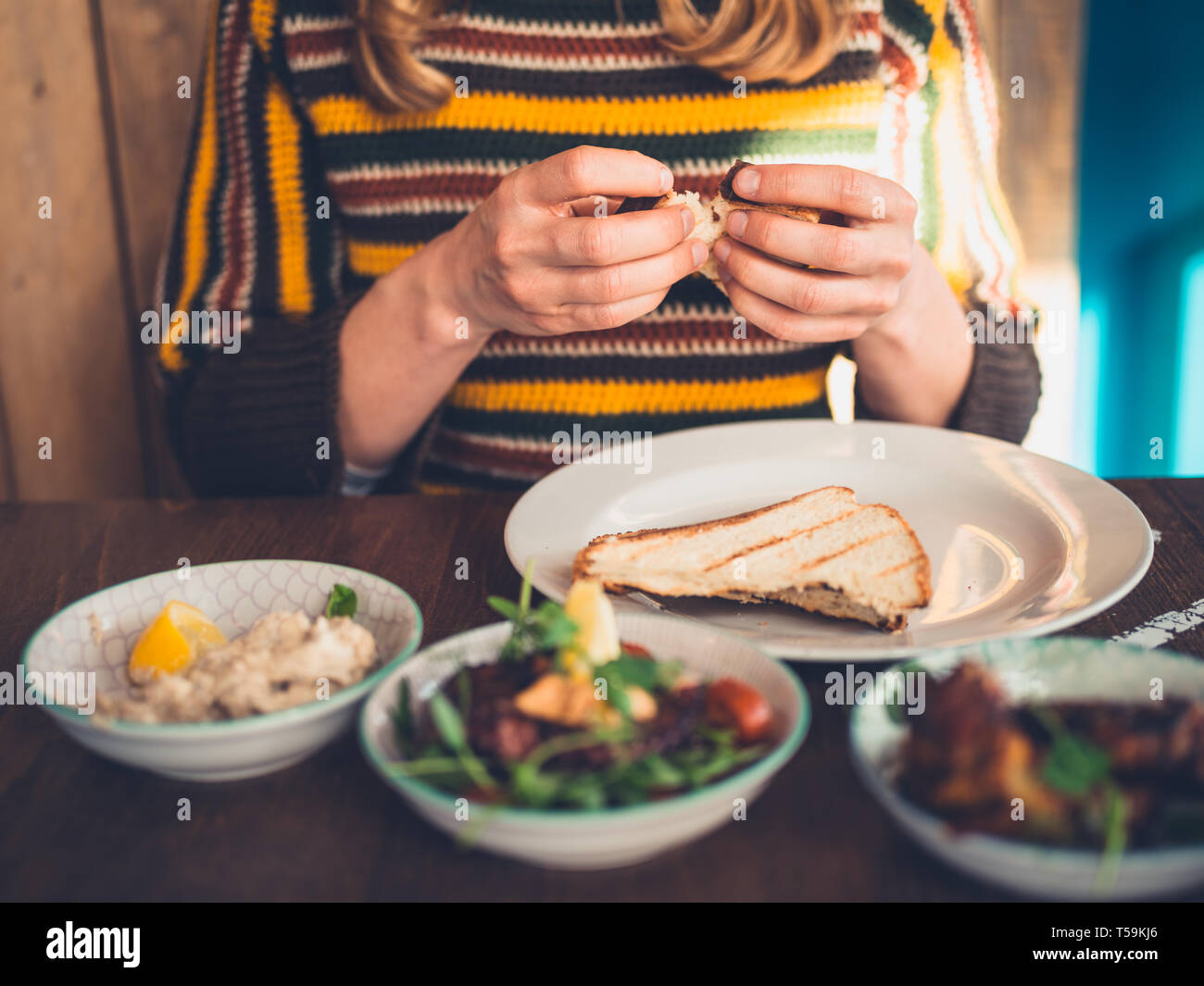 Woman eating tapas hi-res stock photography and images - Alamy