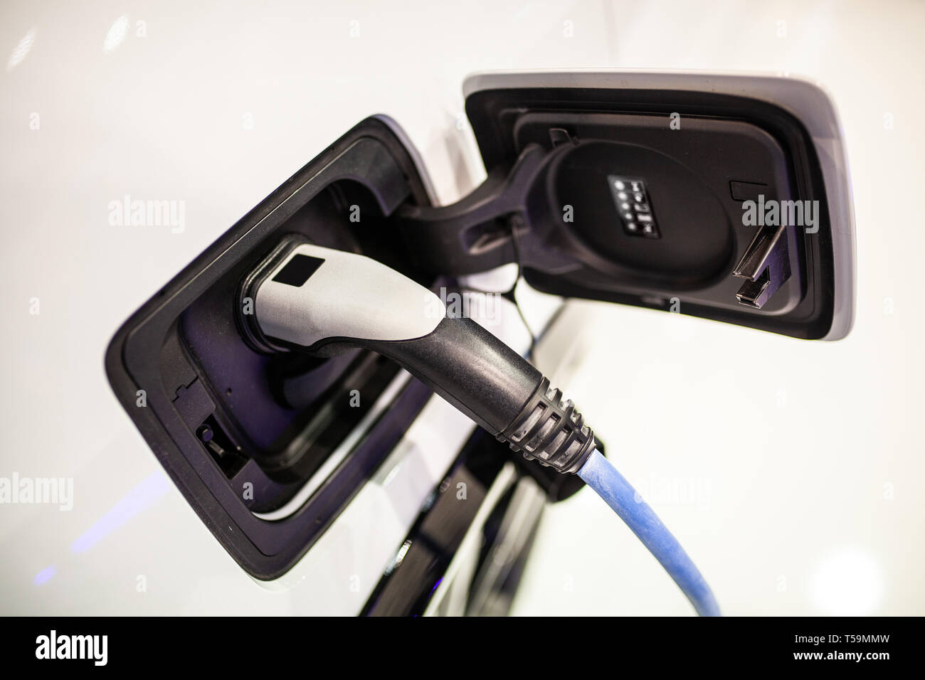 Electric car charging socket and plug Stock Photo - Alamy