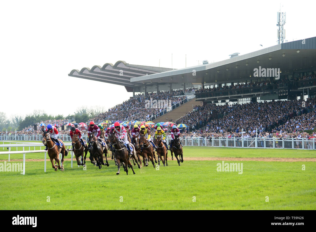 The Boylesports Grand National. Runners passing the packed stands with ...