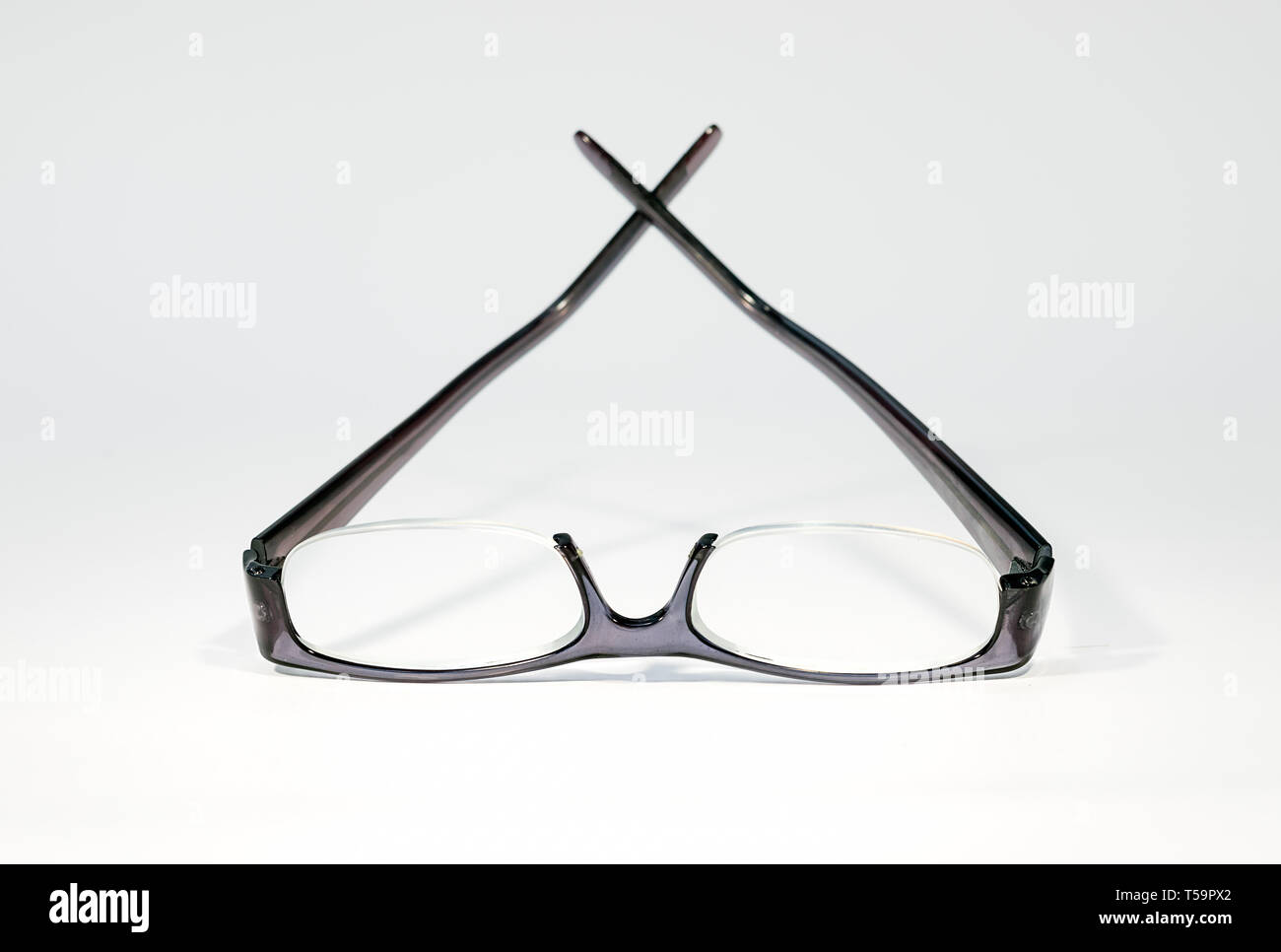 Half frame glasses hi-res stock photography and images - Alamy