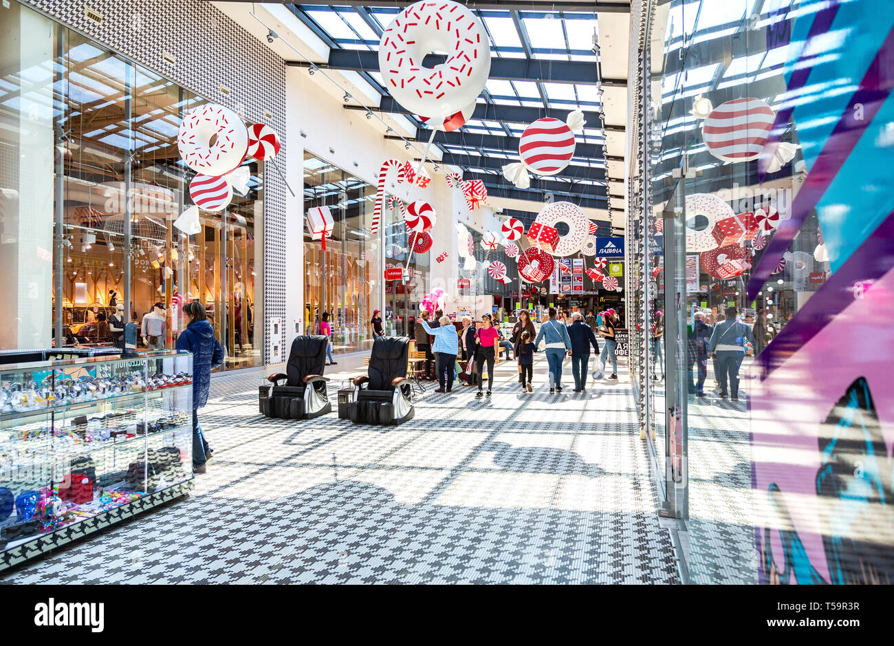 Samara, Russia - April 20, 2019: Interior of shopping mall Ambar. The ...