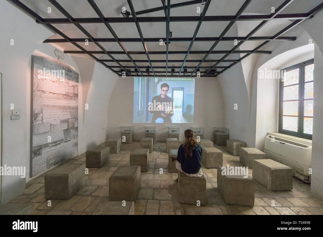 Jerusael, Israel. A girl in the movie room of the Museum of the Jewish ...