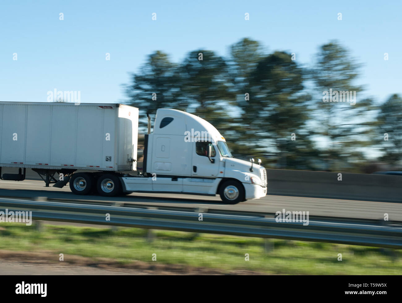 Heavy-truck moving on the highway Stock Photo - Alamy
