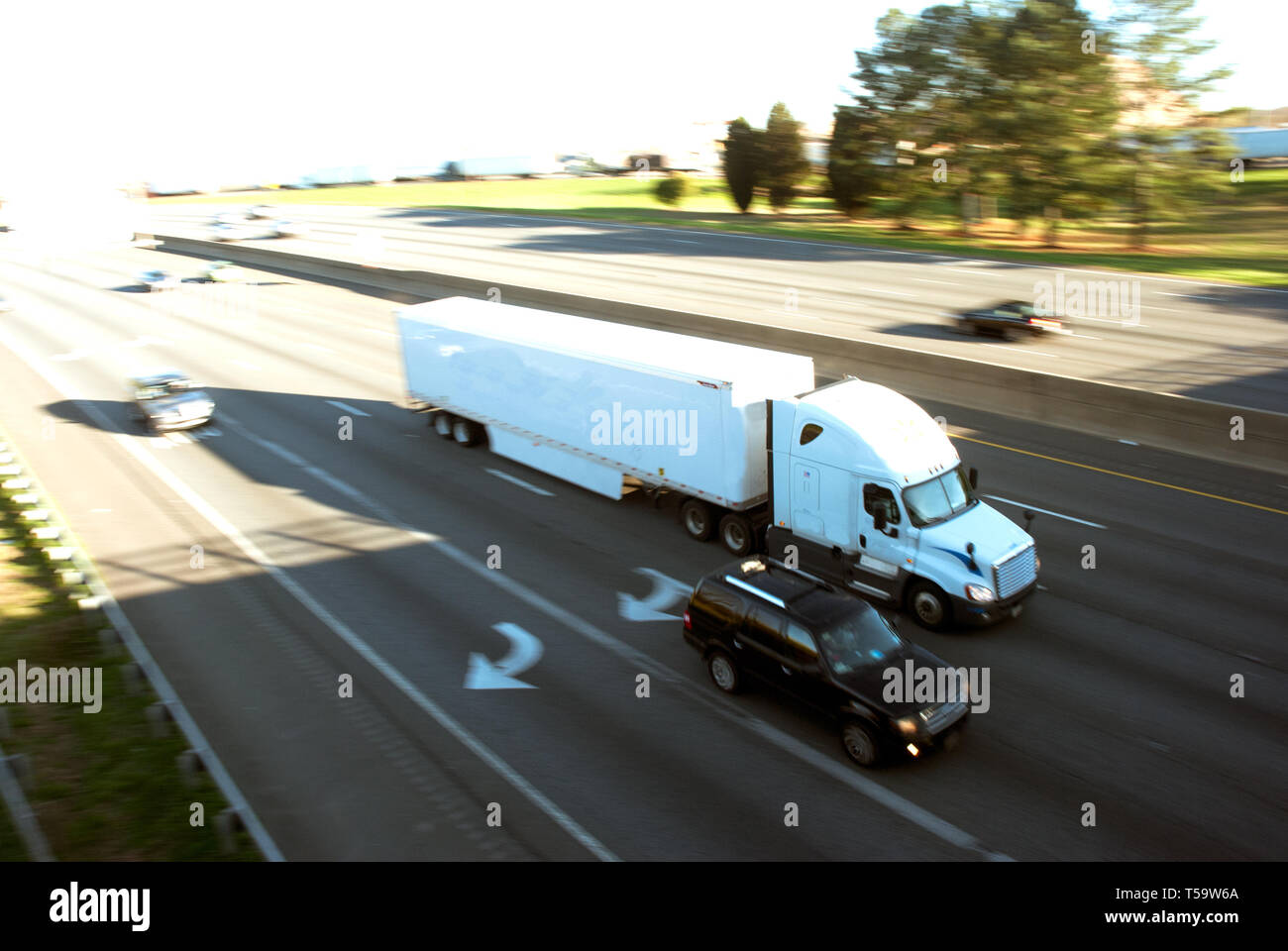 Heavy-truck moving on the highway Stock Photo - Alamy
