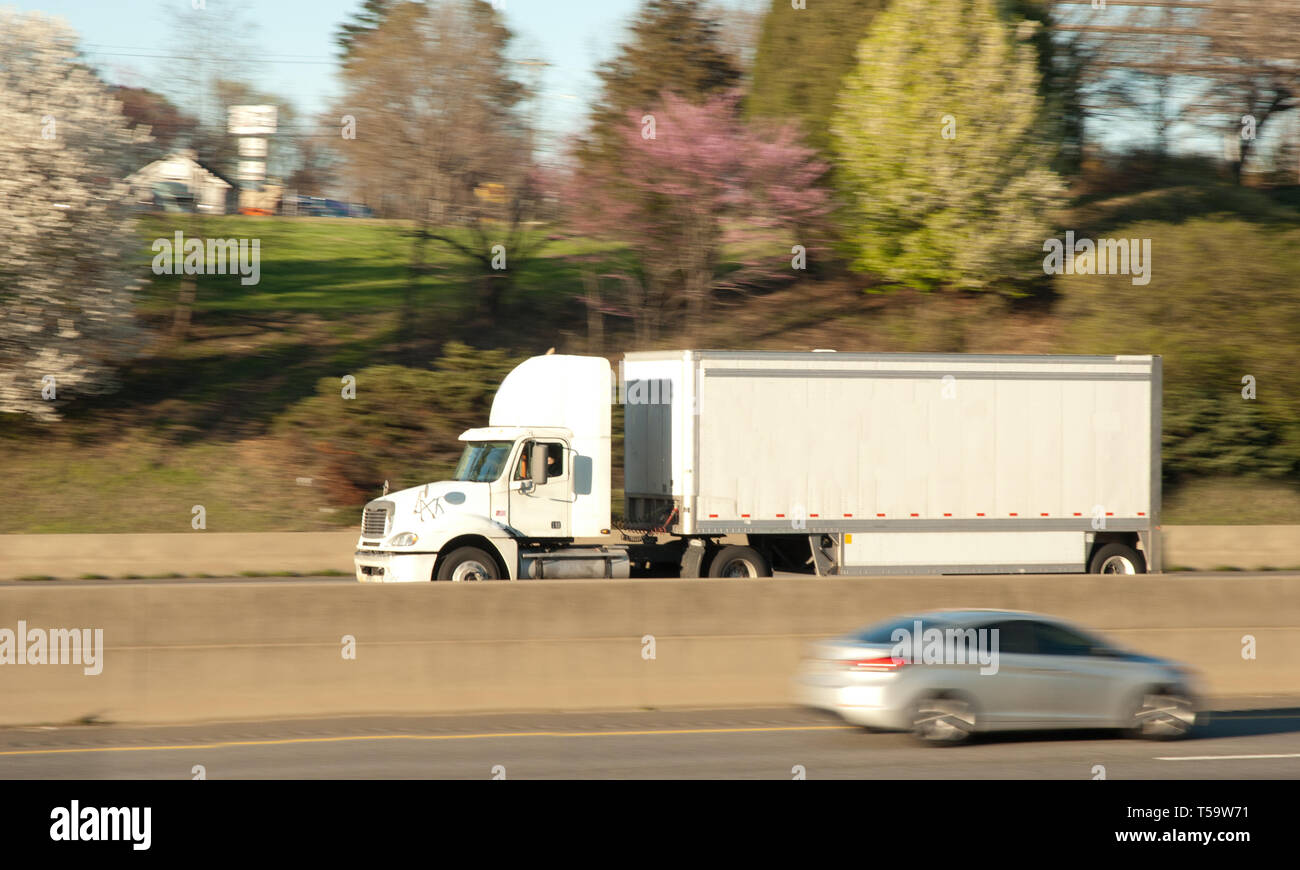 Heavy-truck moving on the highway Stock Photo - Alamy