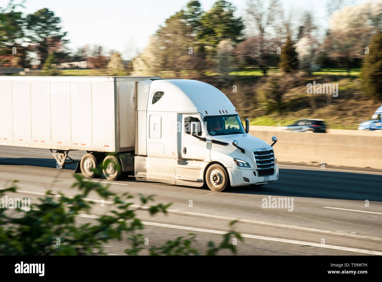 Heavy-truck moving on the highway Stock Photo - Alamy