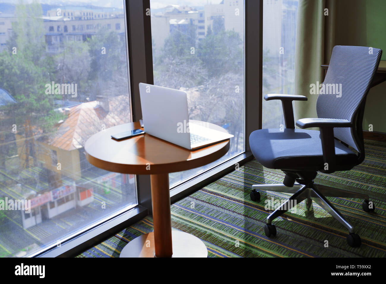 Workplace at the panoramic window Stock Photo - Alamy