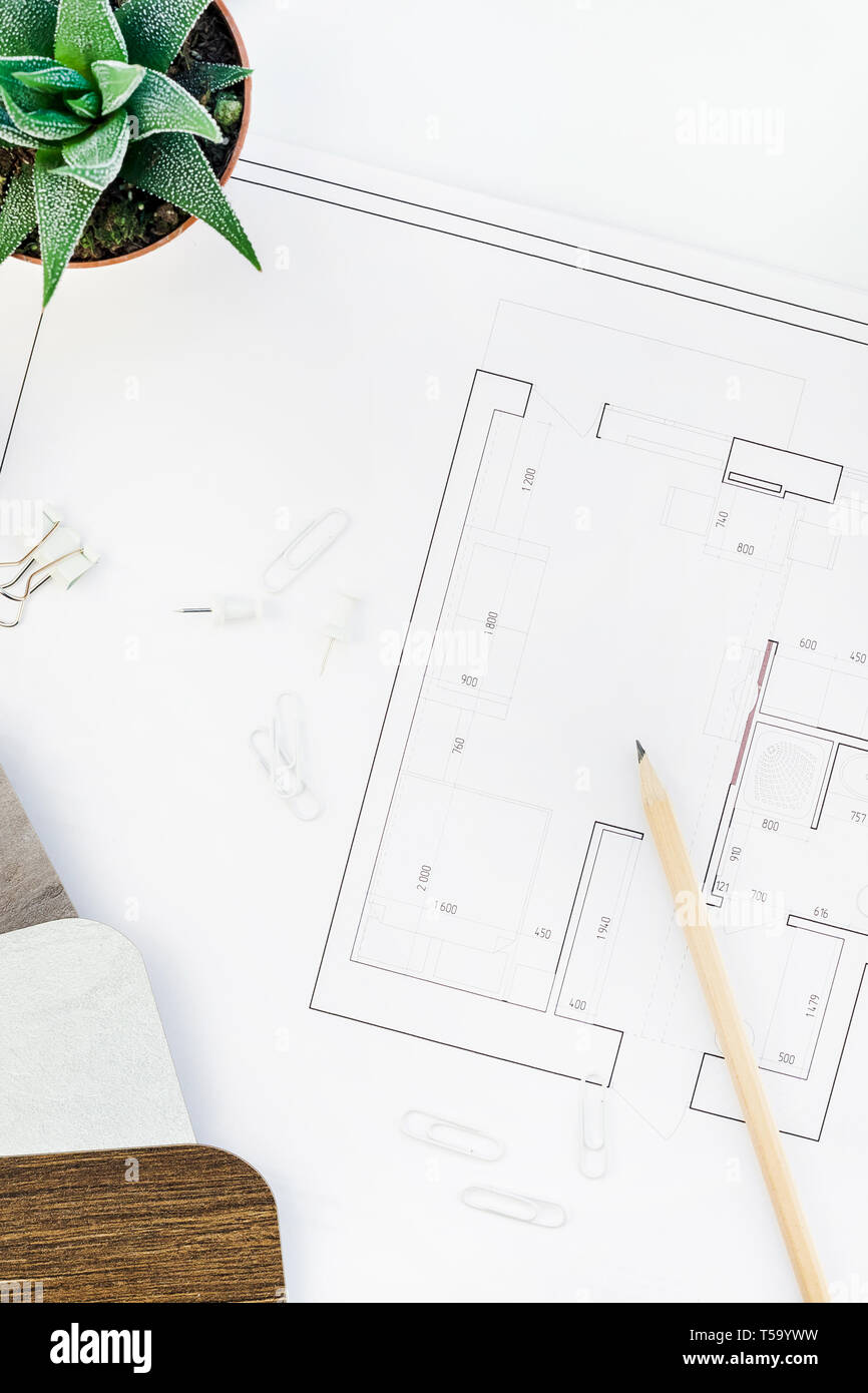 Creative flat lay overhead top view blueprints architectural flat ...