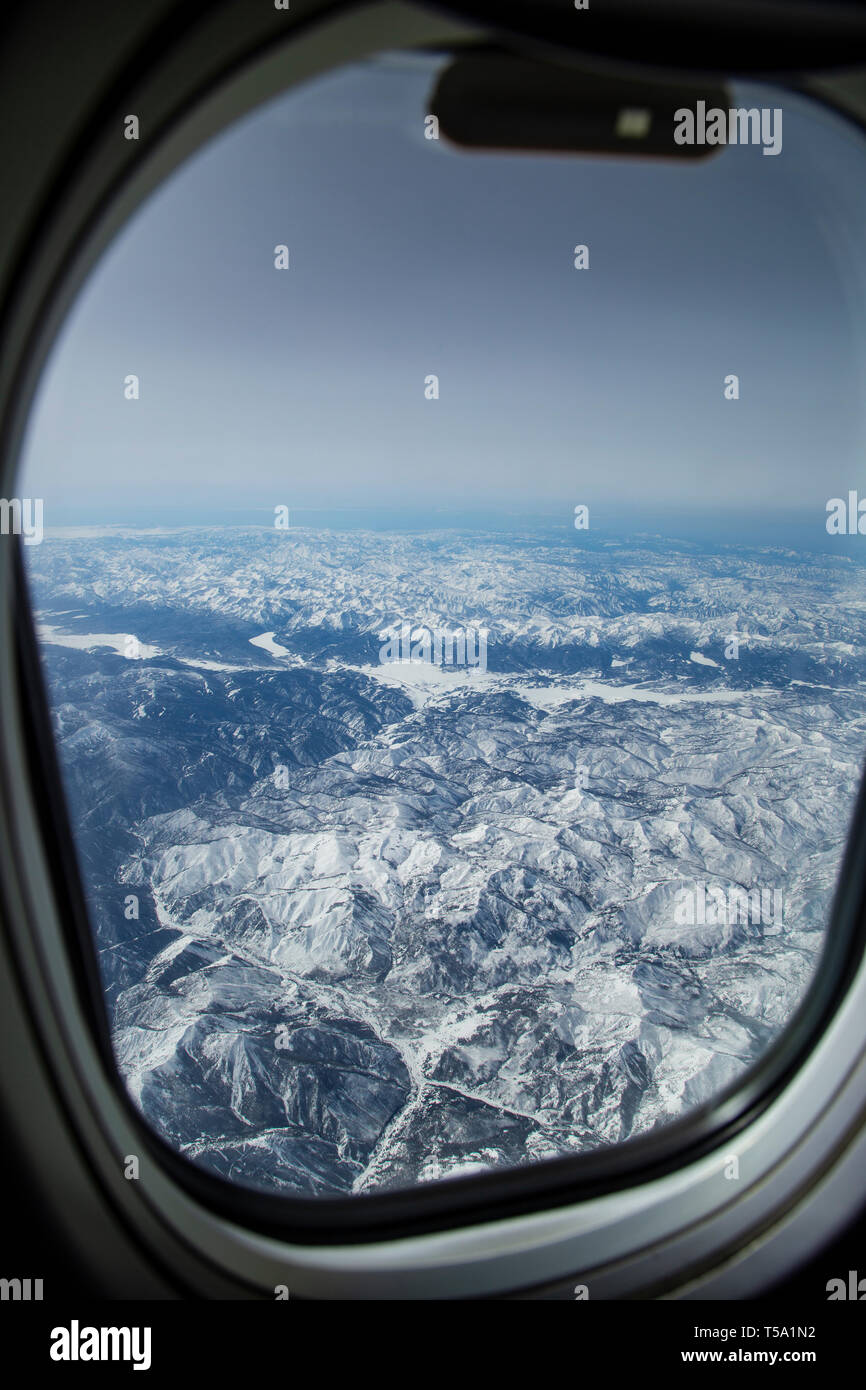 View of Colorado Rocky Mountains from airplane seat Stock Photo - Alamy