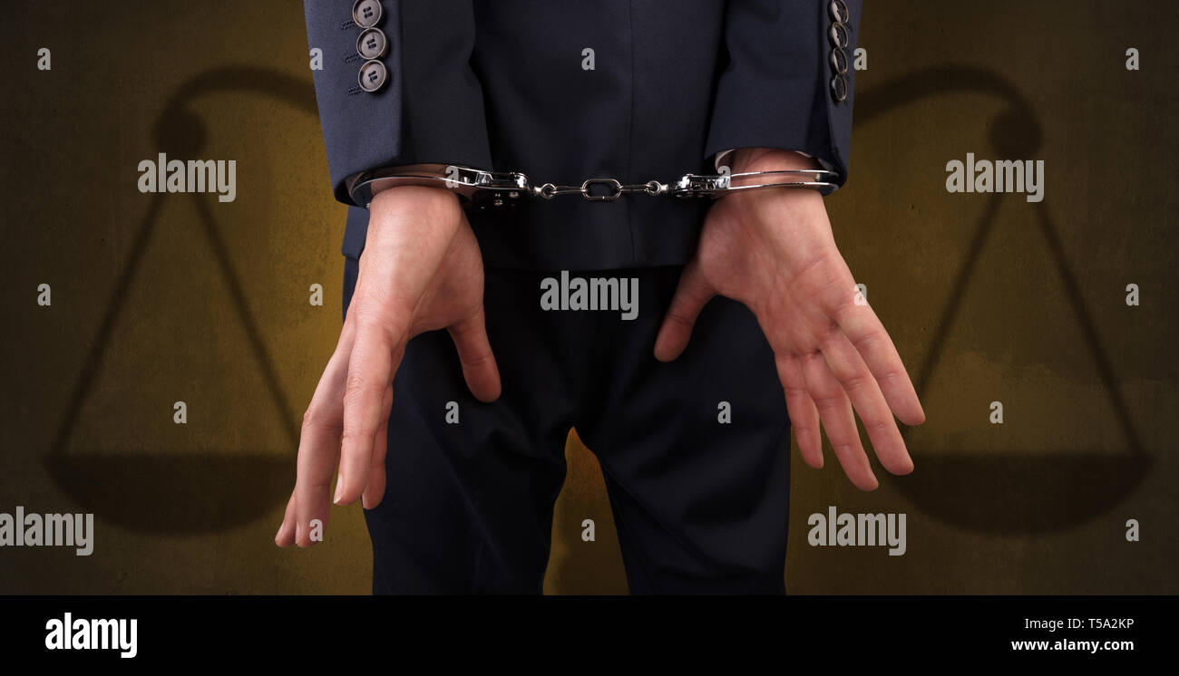 Man getting arrested suit hi-res stock photography and images - Alamy