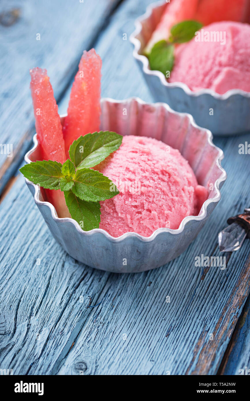 Watermelon ice cream in metal bowls Stock Photo - Alamy