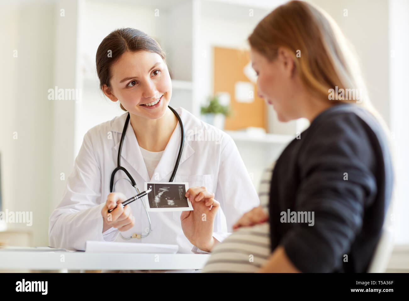 Obstetrician Showing Ultrasound Picture Stock Photo - Alamy
