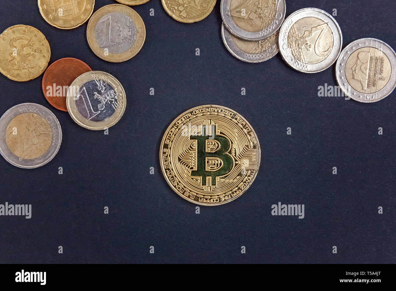 Physical version of Bitcoin, new virtual money . Golden symbolic coins ...