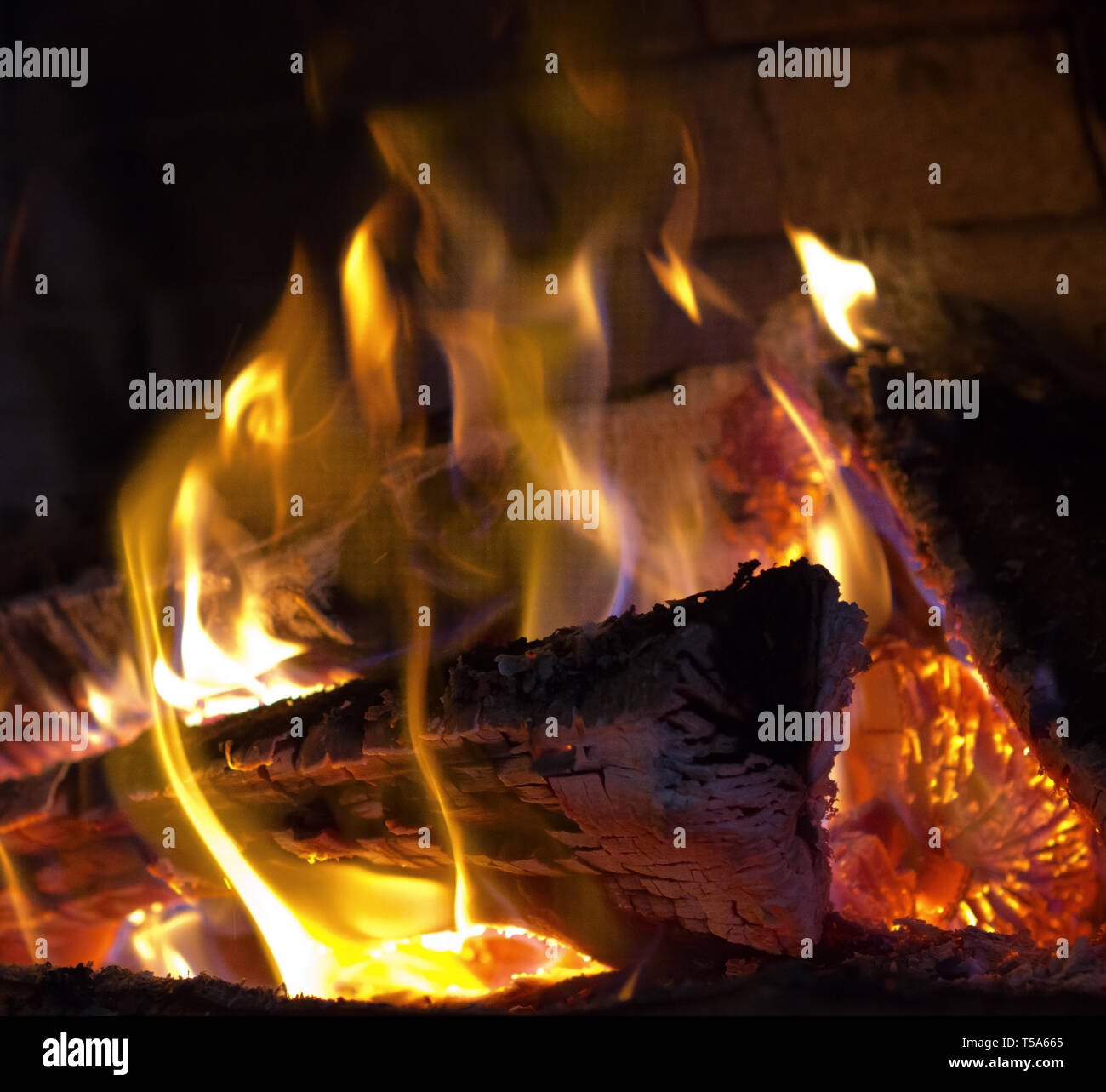Brick fireplace fire color hi-res stock photography and images - Alamy