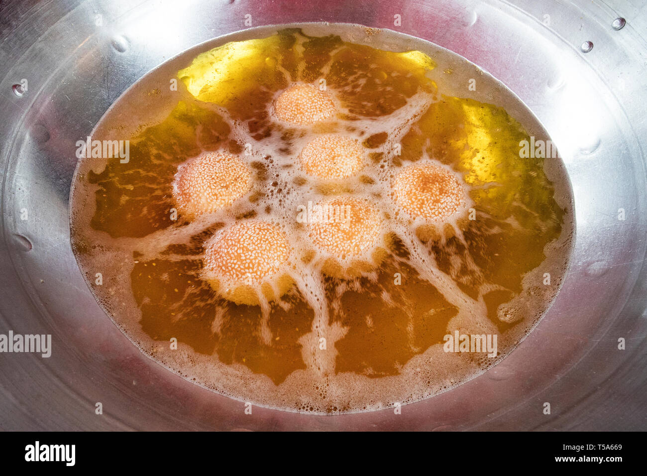 Vietnamese traditional Orange Cake, a fried ball of glutinous rice ...