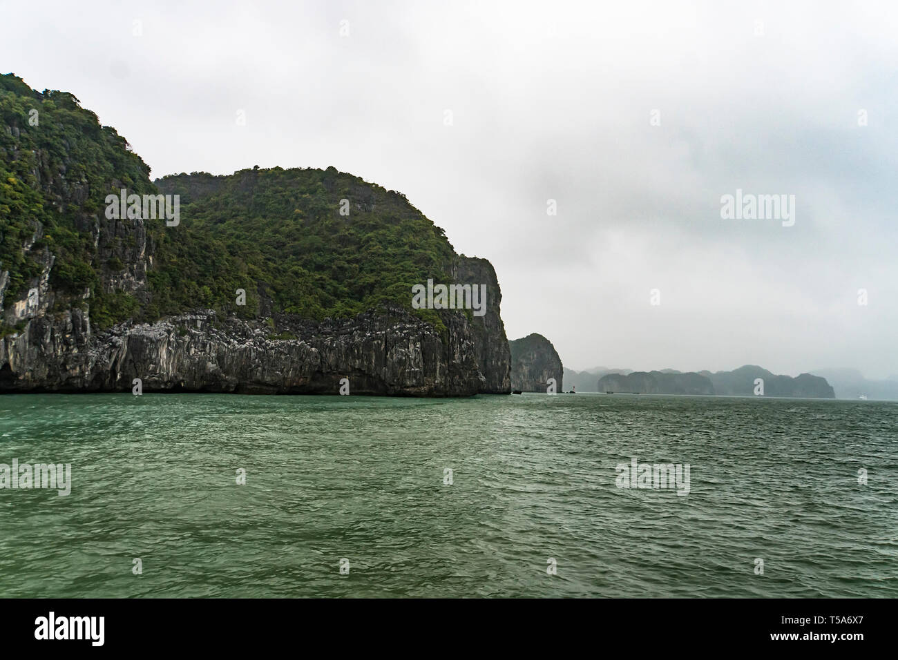 Vietnam halong bay misty seascape hi-res stock photography and images ...