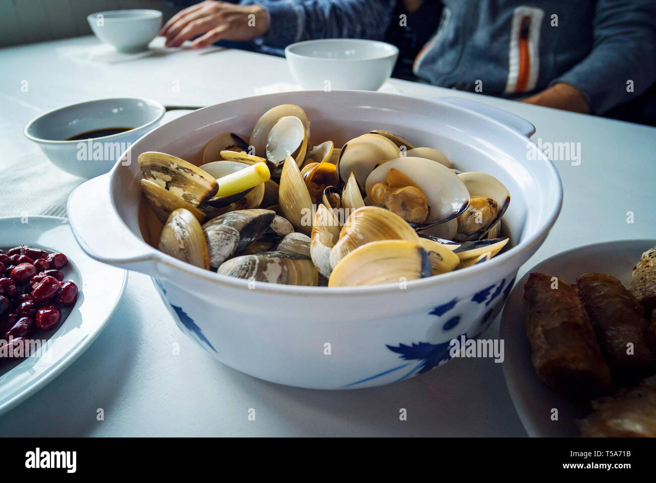 cooked open blue mussels on the table in the pot Stock Photo - Alamy