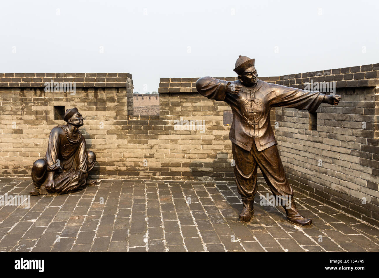 Aug 2013 - Pingyao, China - Decorative statues on the ancient walls ...
