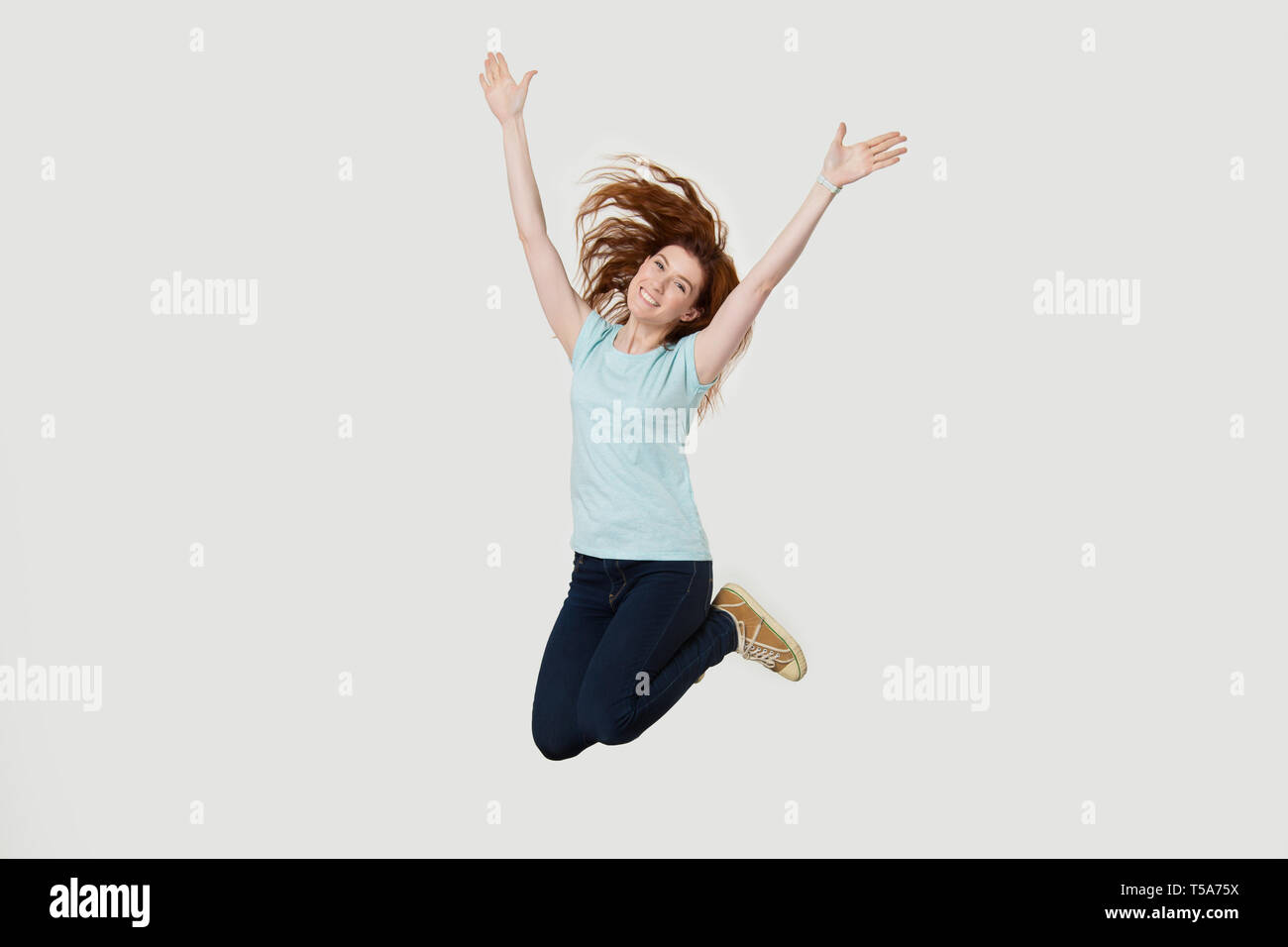 Happy girl raise hands up hi-res stock photography and images - Alamy
