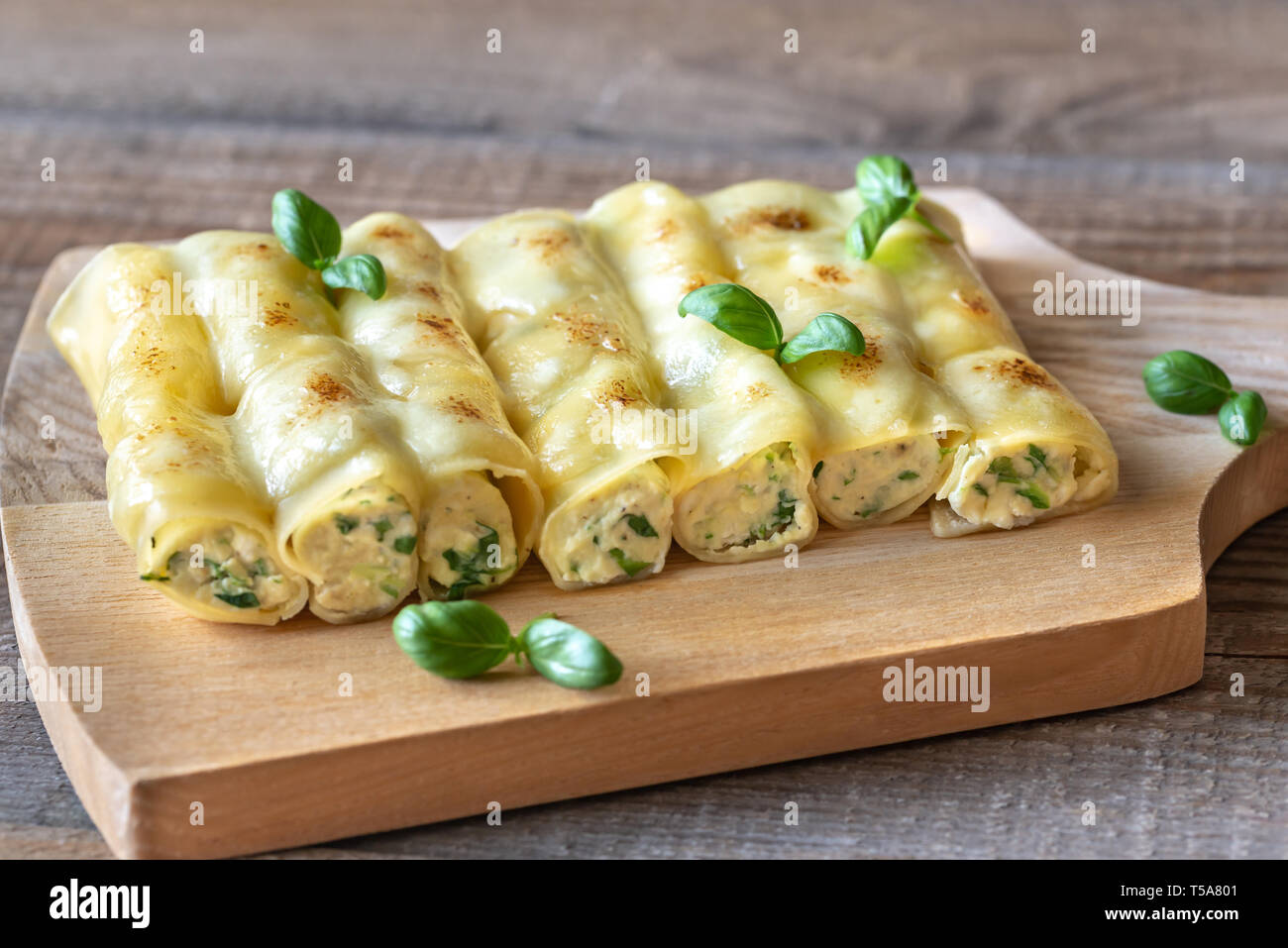 Cannelloni pasta stuffed with ricotta and spinach Stock Photo - Alamy