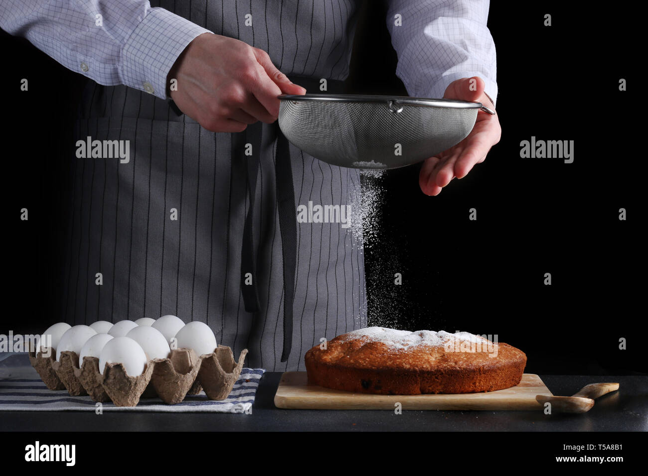 chef make cake. pie making. recipe concept on dark background Stock ...
