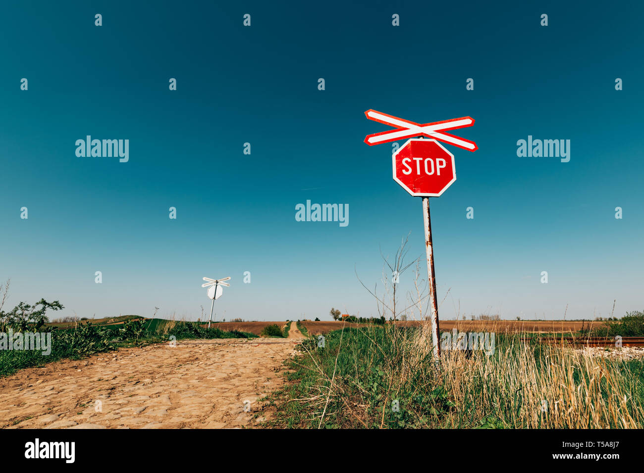 Stop sign at intersection hi-res stock photography and images - Alamy