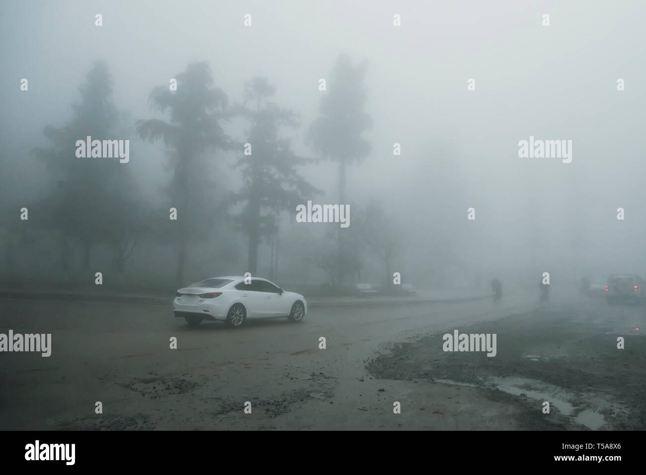 Car driving slowly hi-res stock photography and images - Alamy