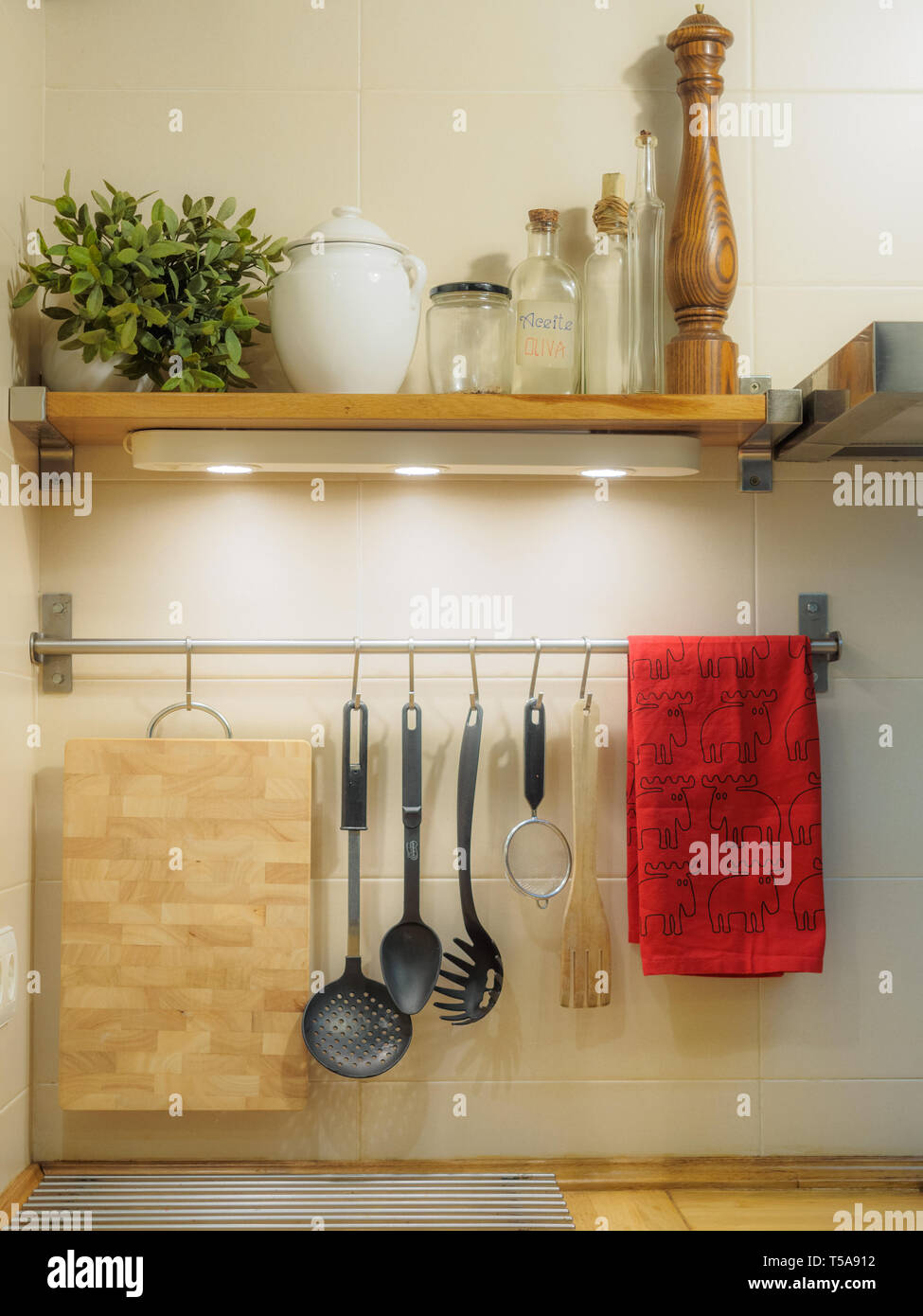 Kitchen utensils hanging hi-res stock photography and images - Alamy