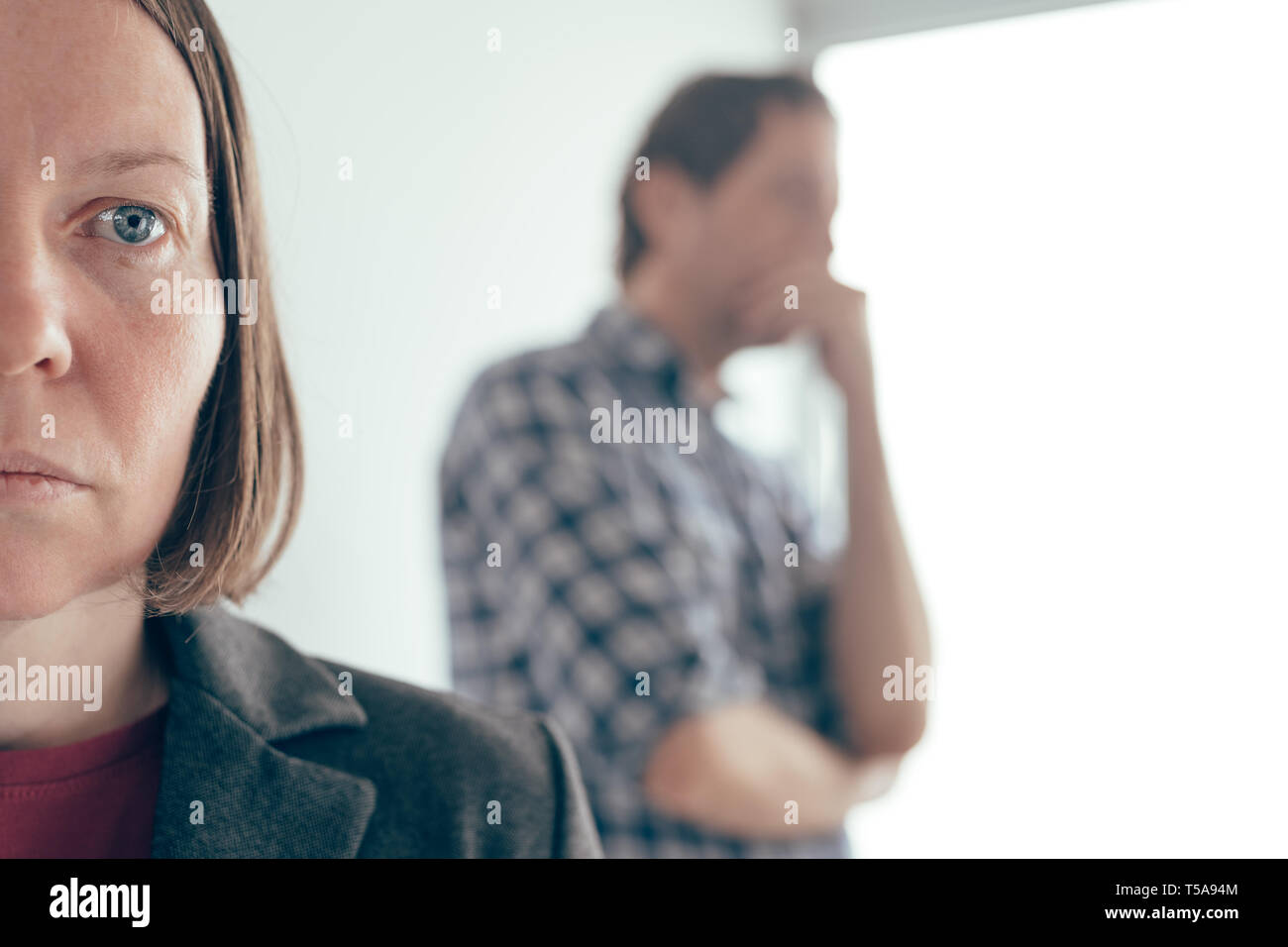 Husband and wife arguing, man yelling at woman in domestic dispute ...